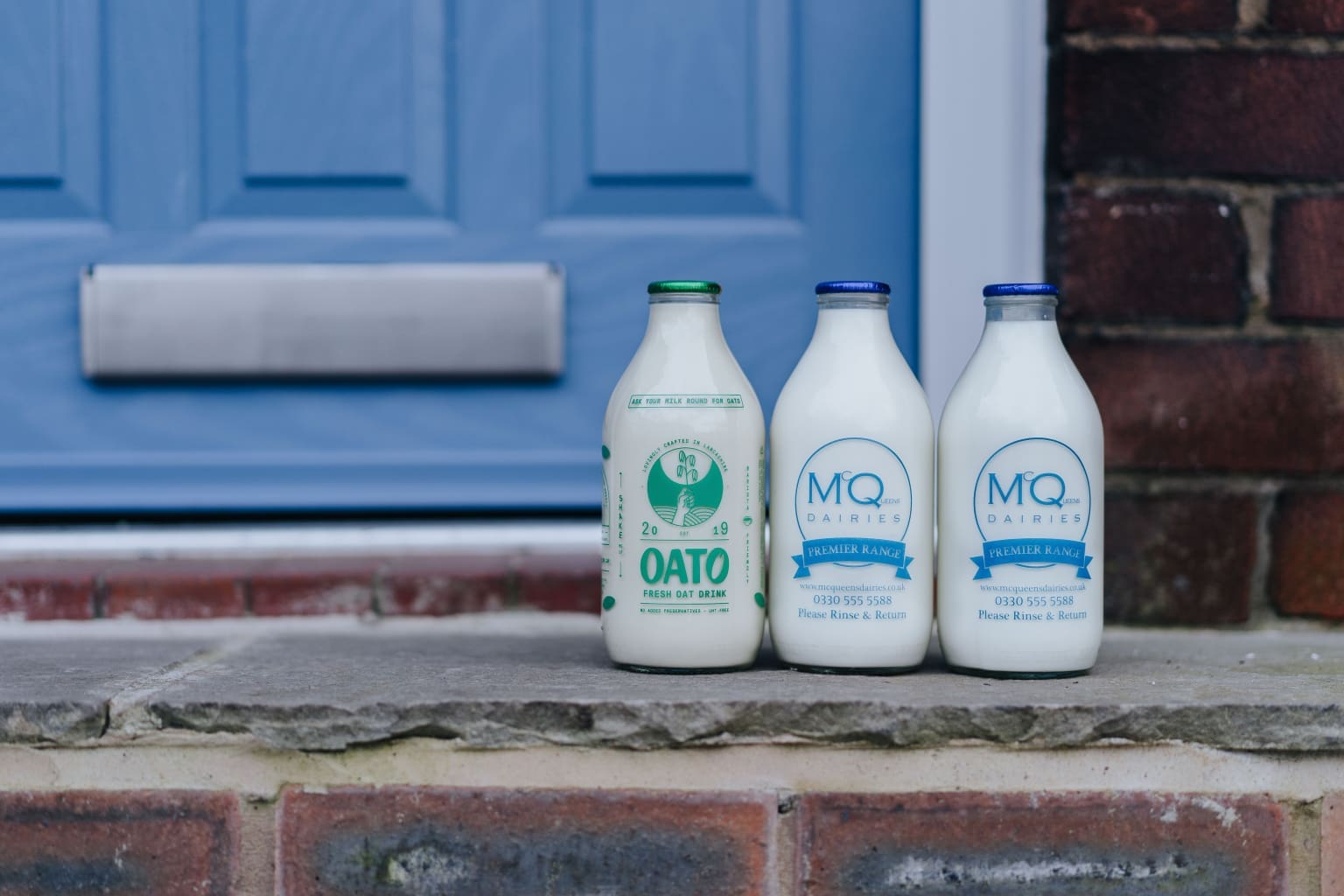 Oat milk in glass reusable bottles from Oato - McQueens Dairies